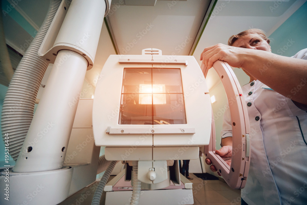 X-ray room in a hospital. Classic ceiling-mounted x-ray system. Stock ...