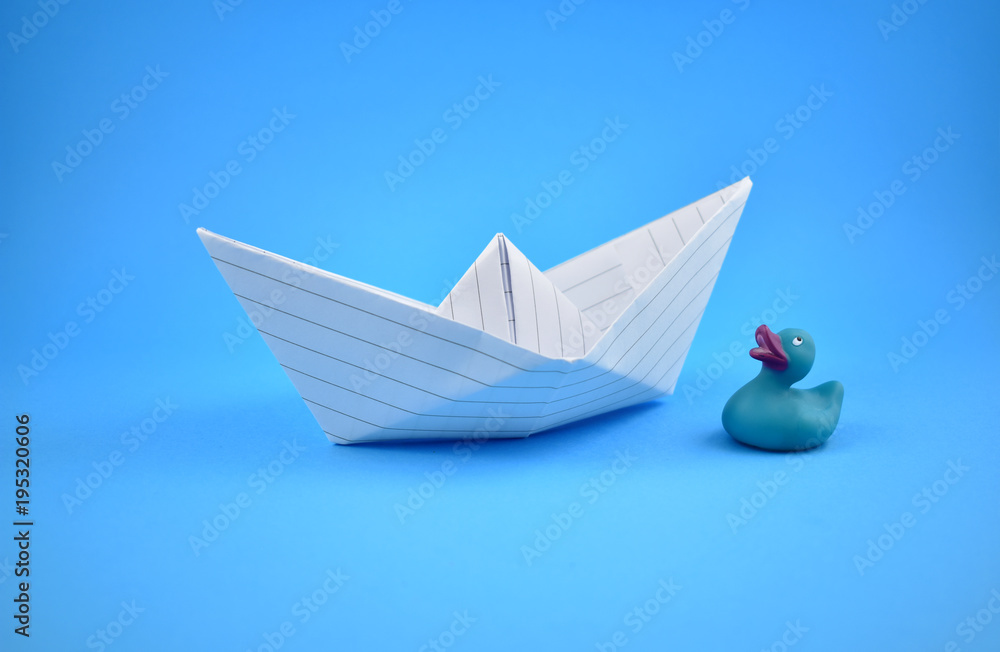 Paper boat stock images. Paper boat with duck. Paper boat on a white ...