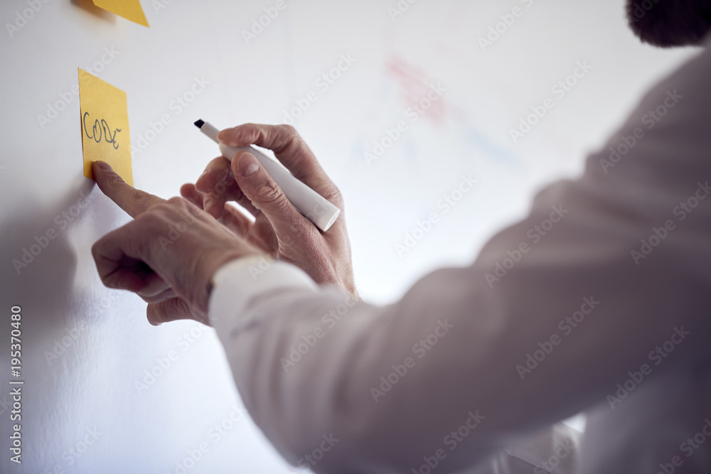 Handwriting sticky note on whiteboard Stock Photo | Adobe Stock