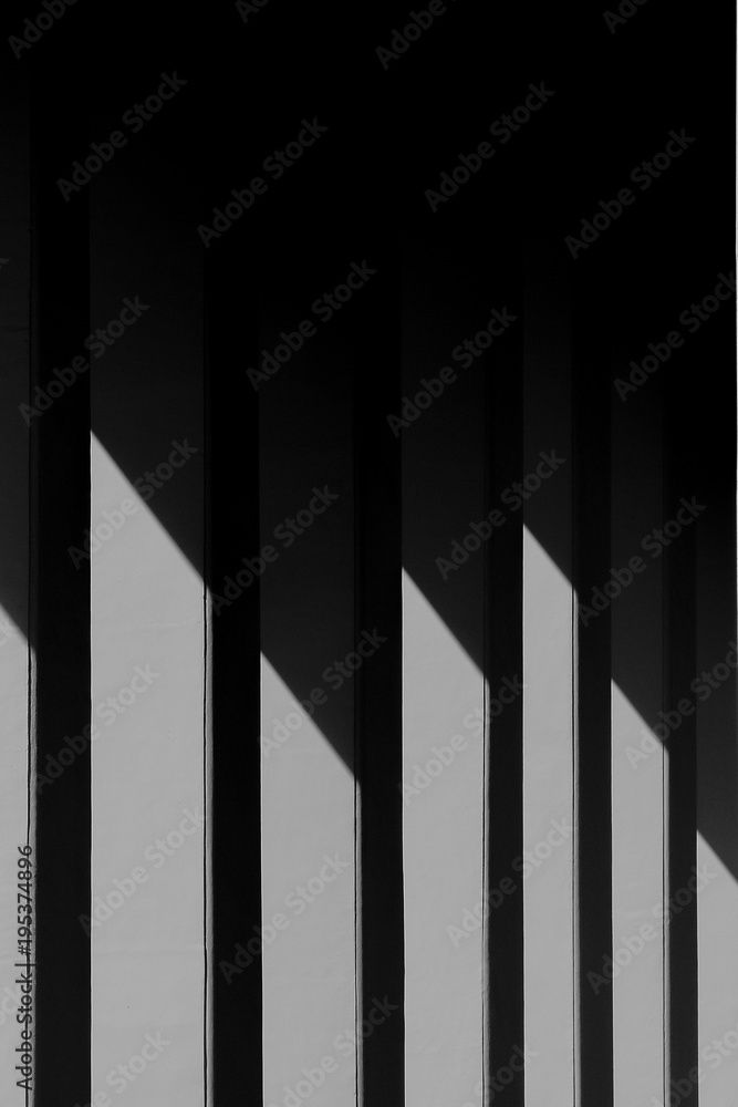 Foto de Architecture of pillars with shadow and light - monochrome do ...