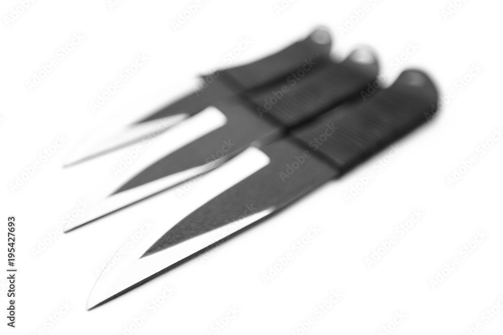 Knives, sharp ends and there is a black plastic handle is placed on the ...