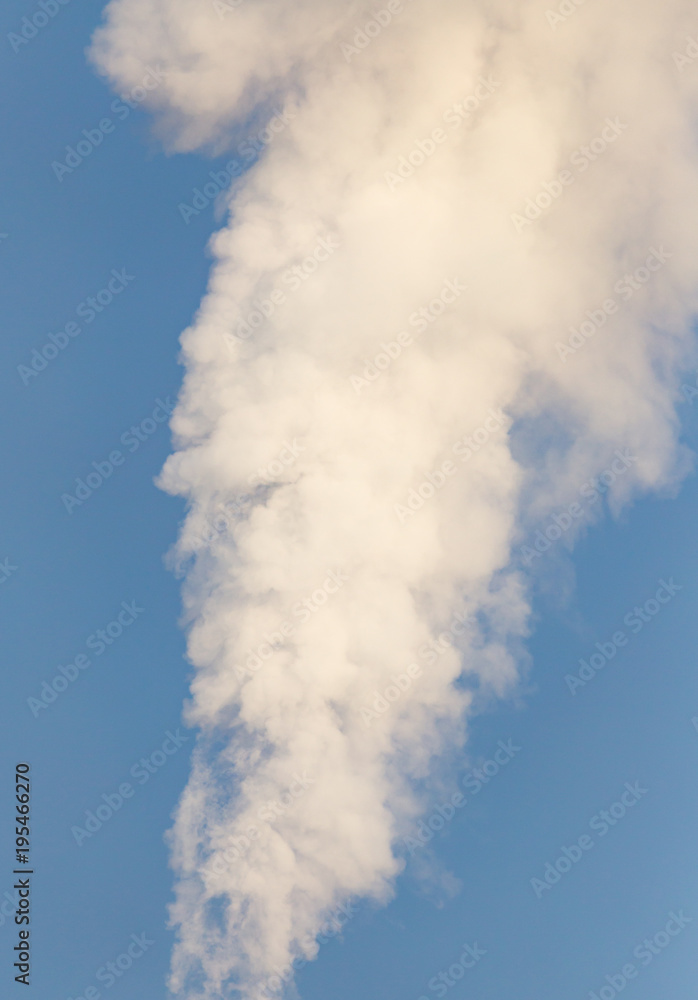 smoke from a pipe in the factory against a blue sky Stock Photo | Adobe ...