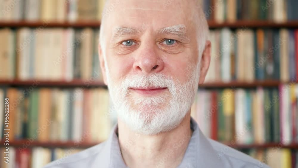 Portrait of good-looking handsome smiling professor in shirt in the ...