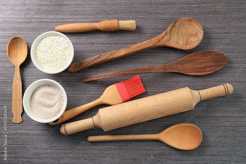 Set of kitchen utensils with products on wooden background. Cooking ...