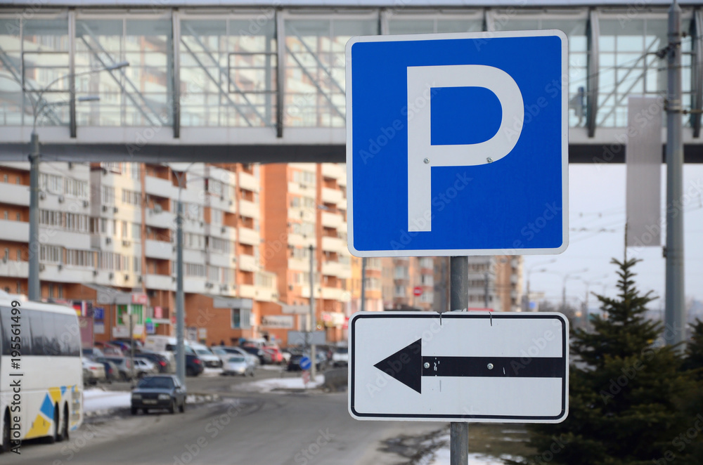 Parking left. Traffic sign with the letter P and the arrows to the left ...