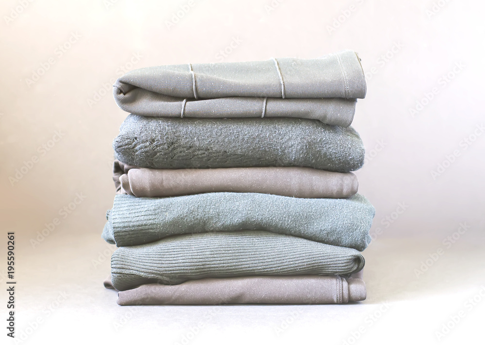 Stack of folded clothes. Colorful textile pile. Stock Photo | Adobe Stock