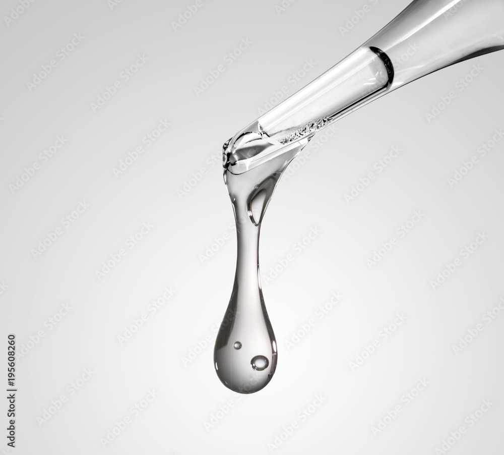 Liquid drop from laboratory glass Pipette Stock Photo | Adobe Stock