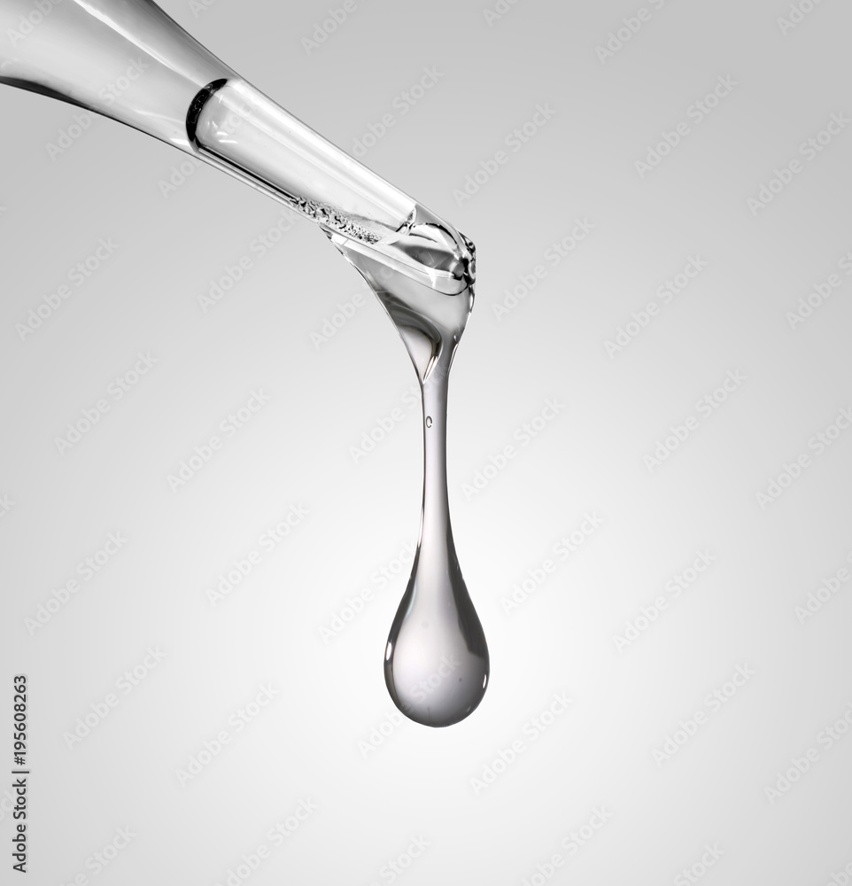 Liquid drop from laboratory glass Pipette Stock Photo | Adobe Stock