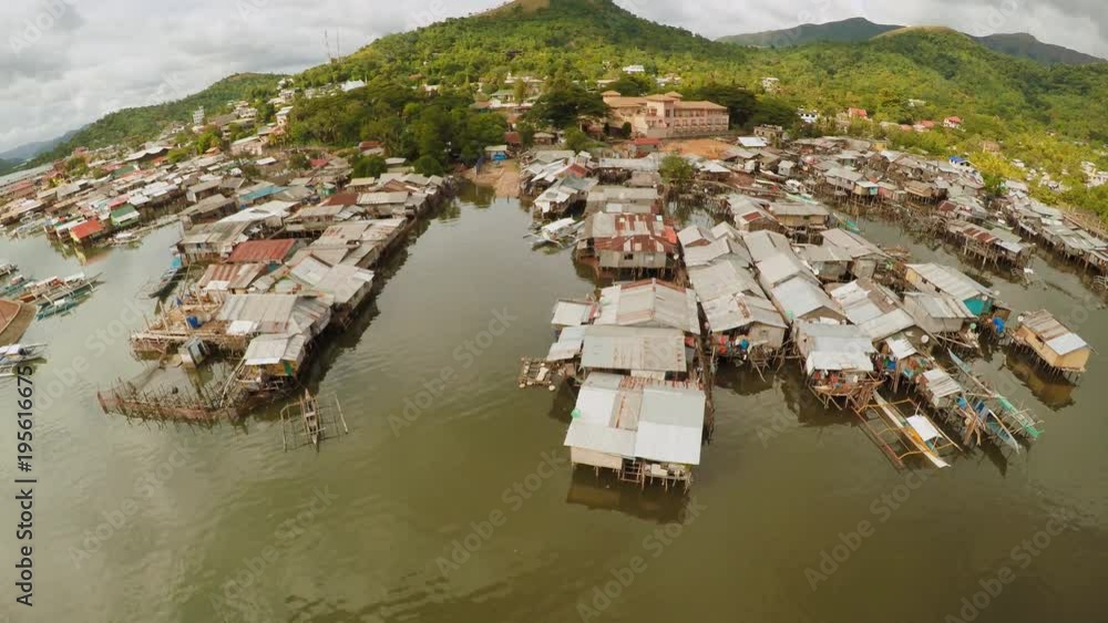 Philippine slums on the beach. Poor area of the city. Coron. Palawan ...