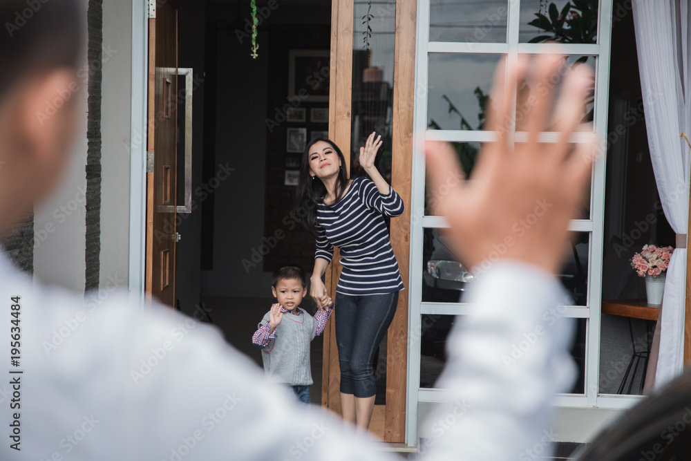 kid waving goodbye to parent Stock Photo | Adobe Stock