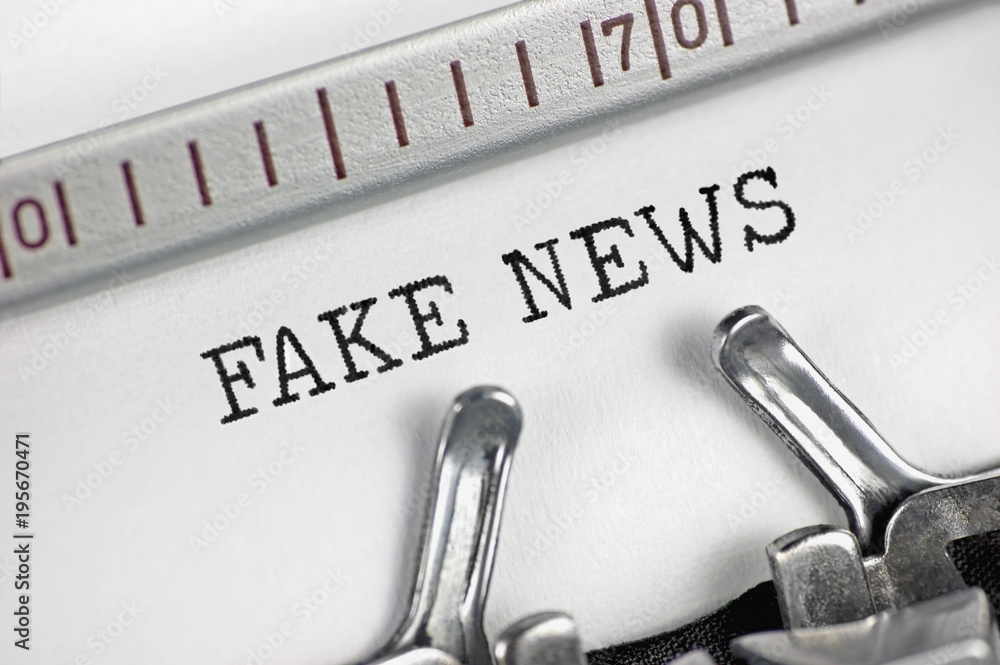 Typewriter typing text fake news, detailed macro closeup, psychological ...