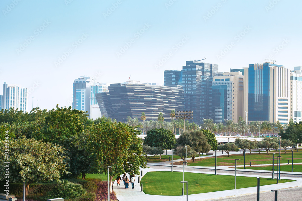 Doha city, Qatar - January 02, 2018: Green public park with modern ...