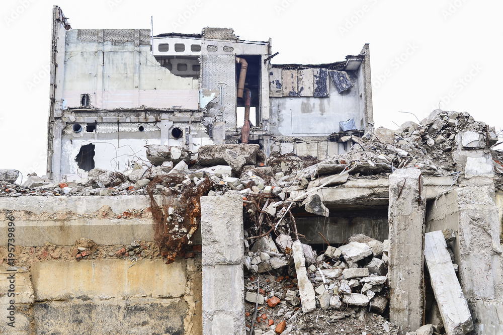 Remains of the destroyed industrial building. The skeleton of a large ...