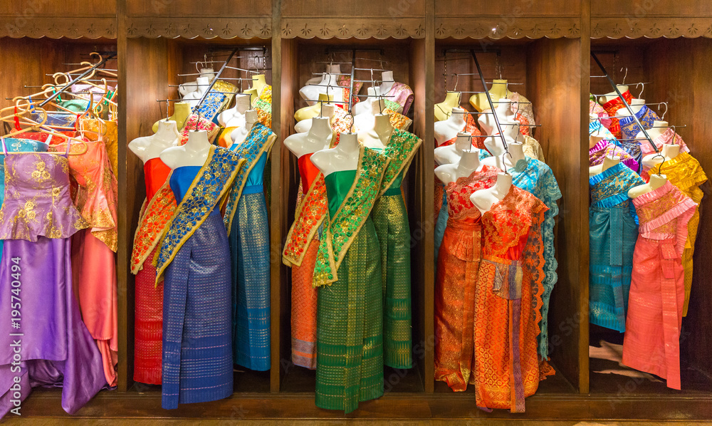 Veriety of thai traditional dresses in store ภาพถ่ายสต็อก | Adobe Stock