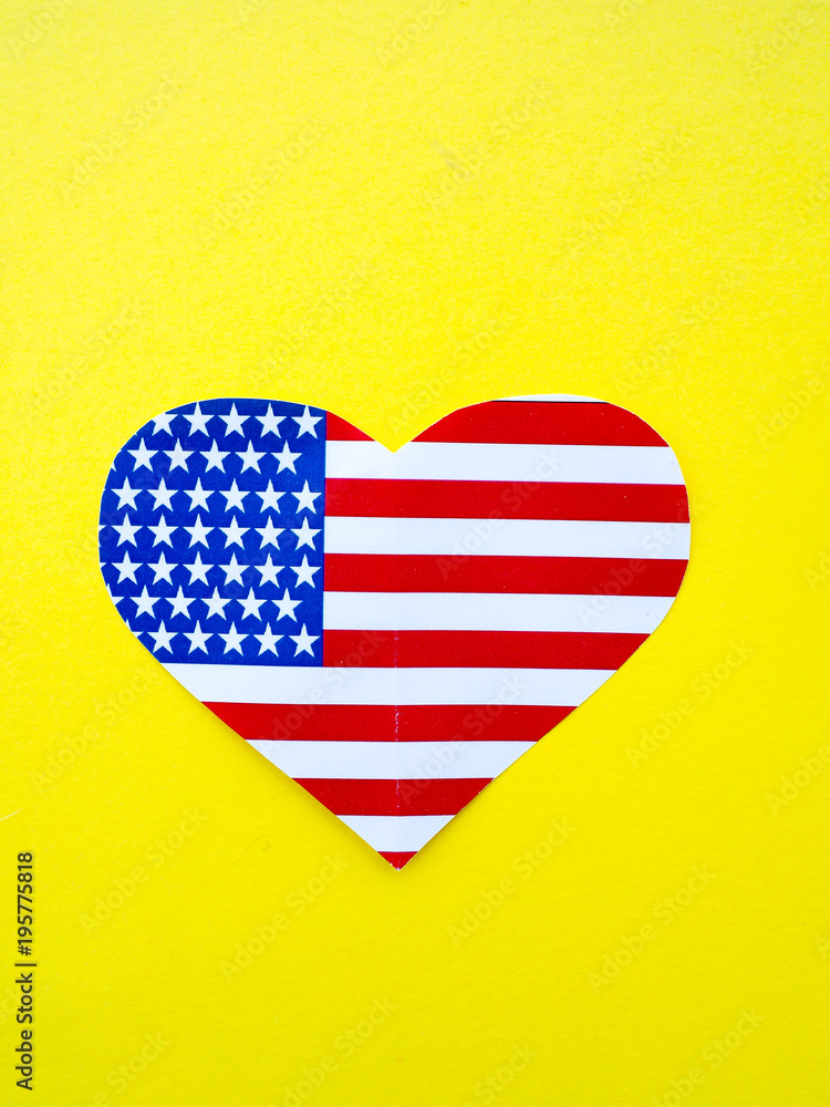 American flag in the shape of a heart on bright yellow background, USA ...