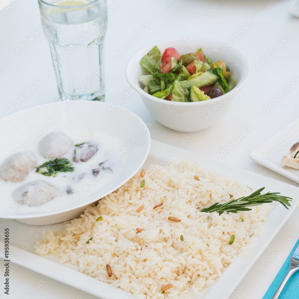 Shakriya - lamb meat in yoghurt sauce, served with white rice and salad ...