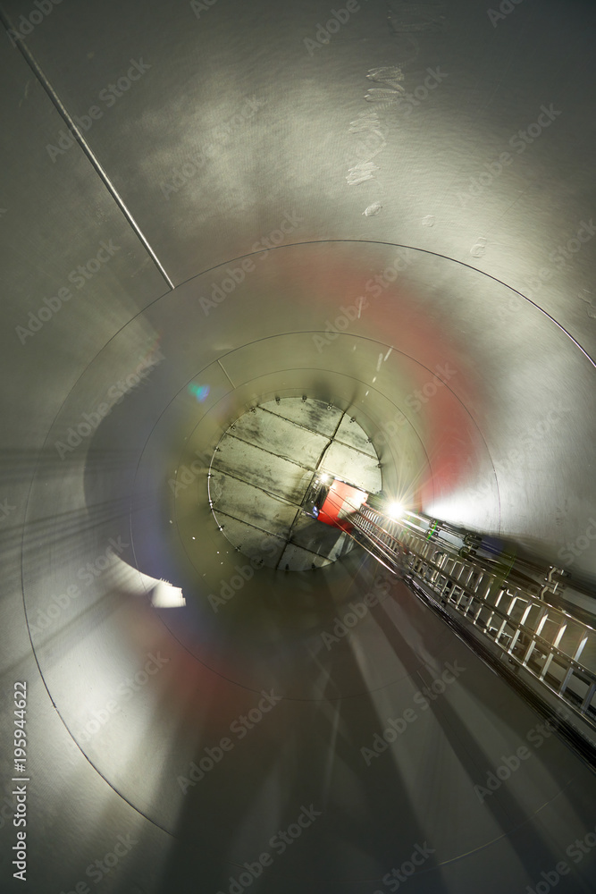 Inside the wind turbines. A wind farm is a group of wind turbines in ...