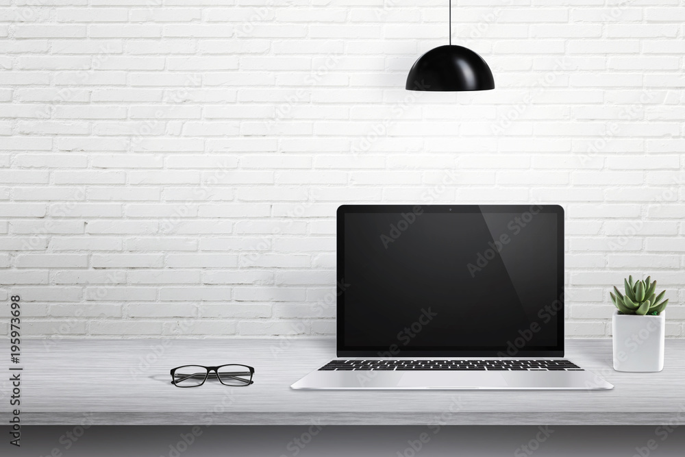Modern laptop computer on desk with blank screen for mockup. White ...