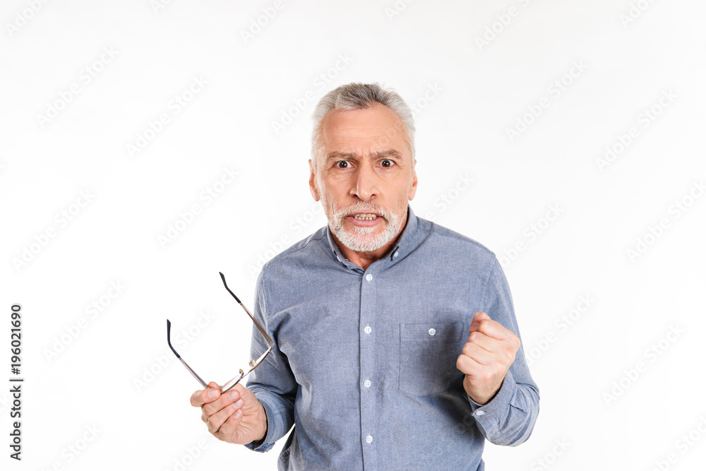 Angry displeased man looking camera seriously isolated Stock Photo ...
