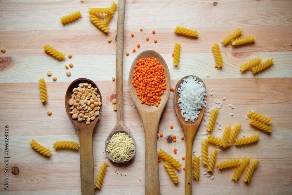 On the surface of wood are the wooden spoons of different kinds, which ...