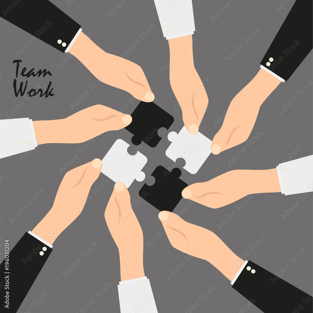 Teamwork and cooperation concept. Hands holding and putting puzzle ...