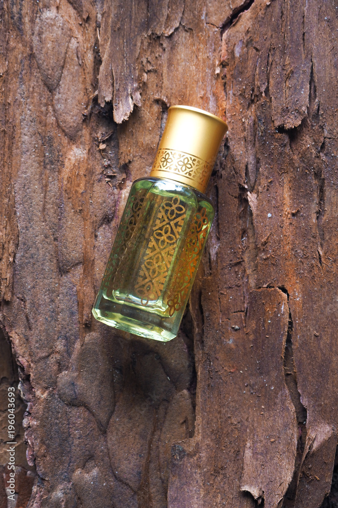 Arabian oud attar perfume or agarwood oil fragrances in mini bottle ...