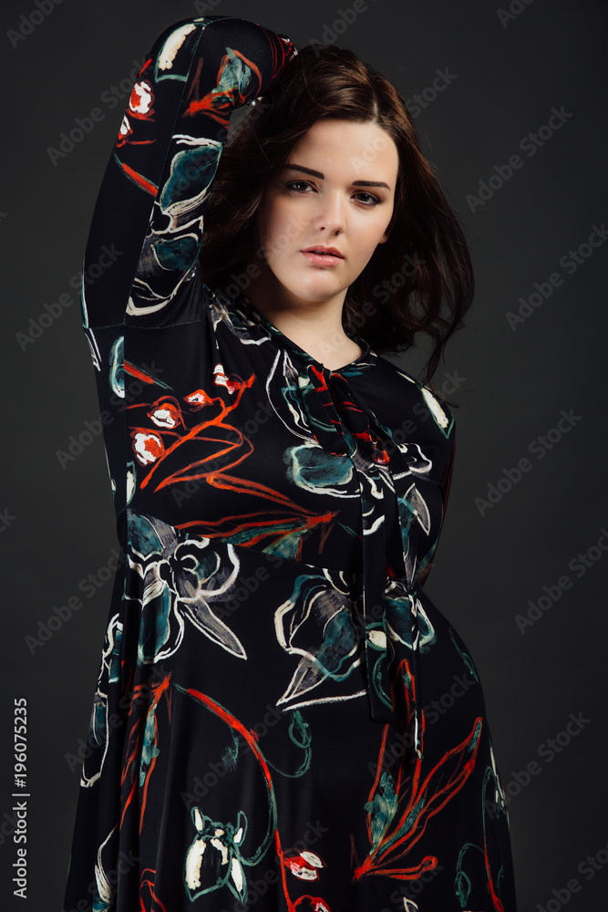 portrait plus size fashion model fat woman on gray studio background ...