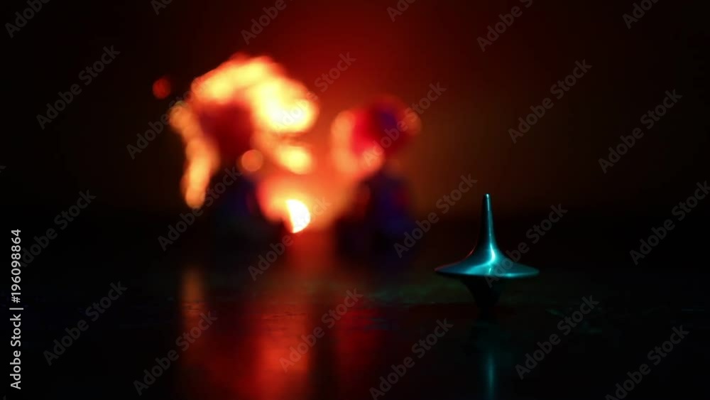 Totem spinning top spinning, wobbling and stopping. Spinning top on ...