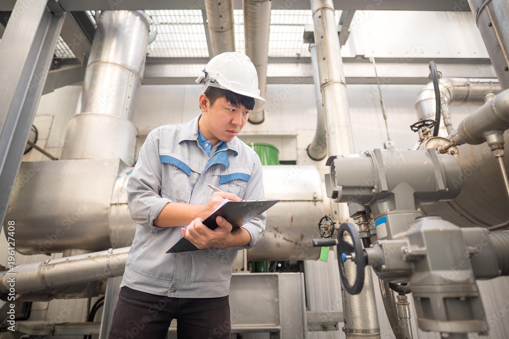 Engineer working and check valve at thermal power plant factory Stock ...
