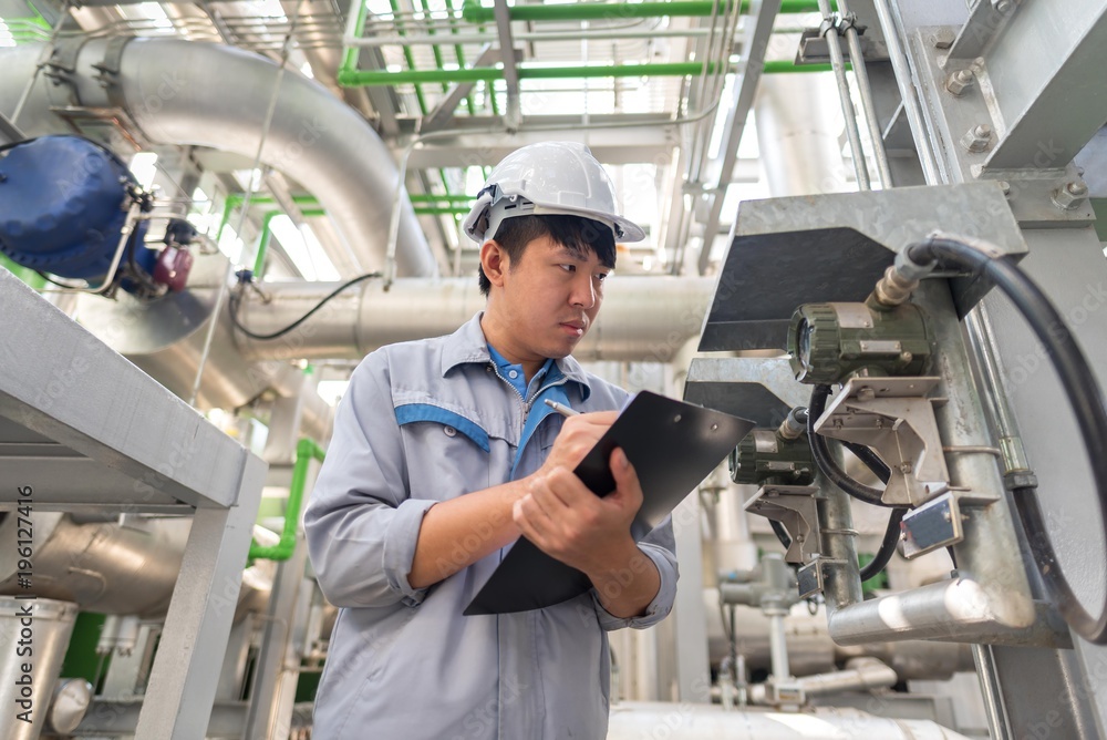 Engineer working and check valve at thermal power plant factory Stock ...