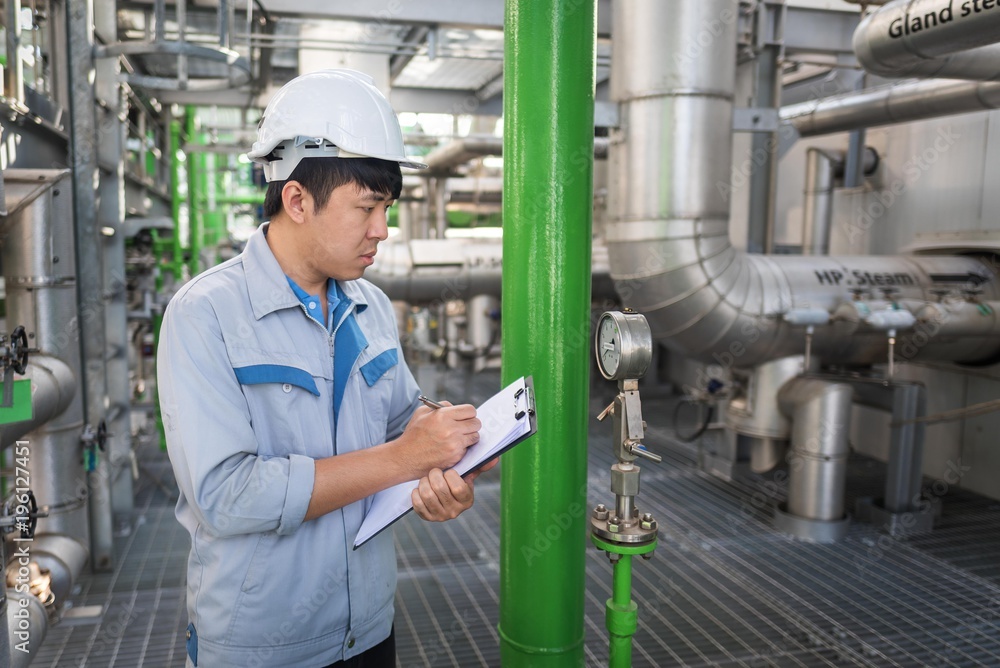 Engineer working and check valve at thermal power plant factory Stock ...