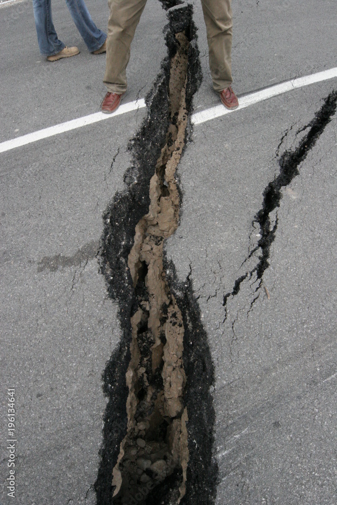 Road collapses with huge cracks. International road collapsed down ...