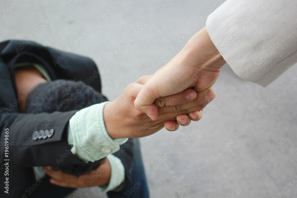 Help Concept, Hands reaching out to helping man sad and depressed ...