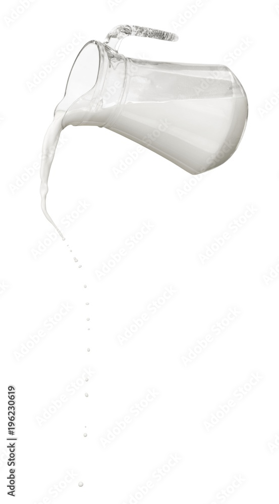 Milk Pouring Out Of the Jug Stock Photo | Adobe Stock