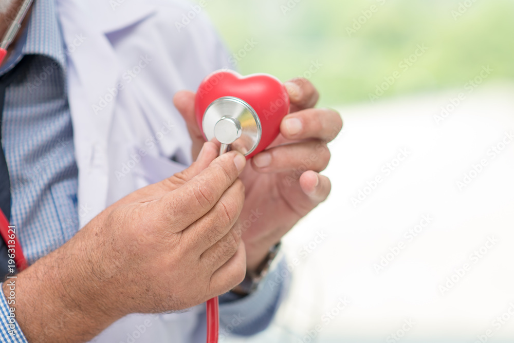 Doctor 're Using Stethoscope to Check Up on Red Heart ,Annual Health ...