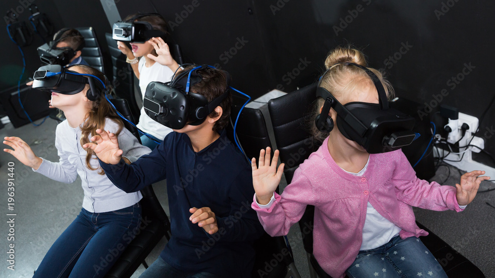 Children play virtual quest room Stock Photo | Adobe Stock
