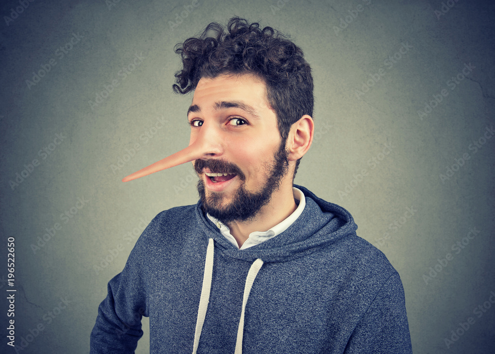 Liar man with long nose isolated on gray background. Human emotions ...