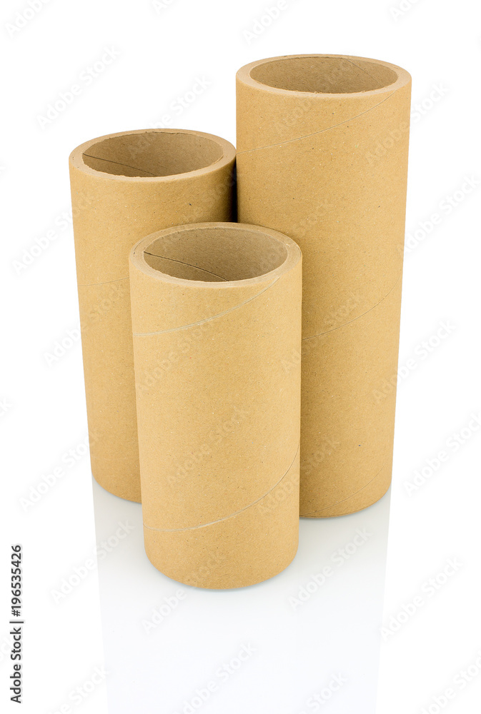 A bunch of brown industrial paper core isolated on white background ...