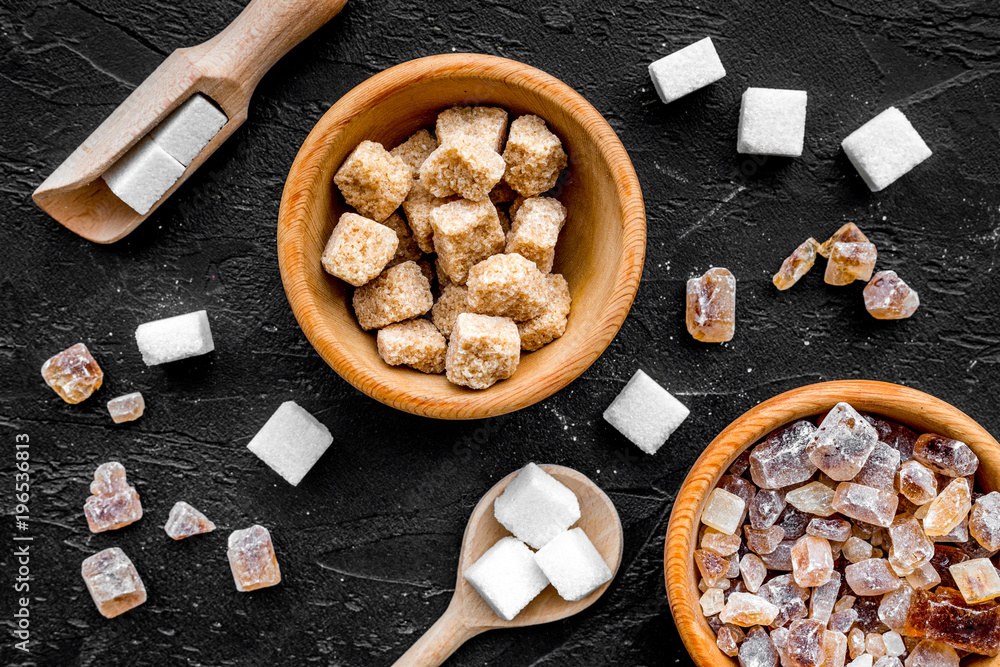 Types of sugar. Candy brown sugar and cane sugar in bowl and scoop on ...