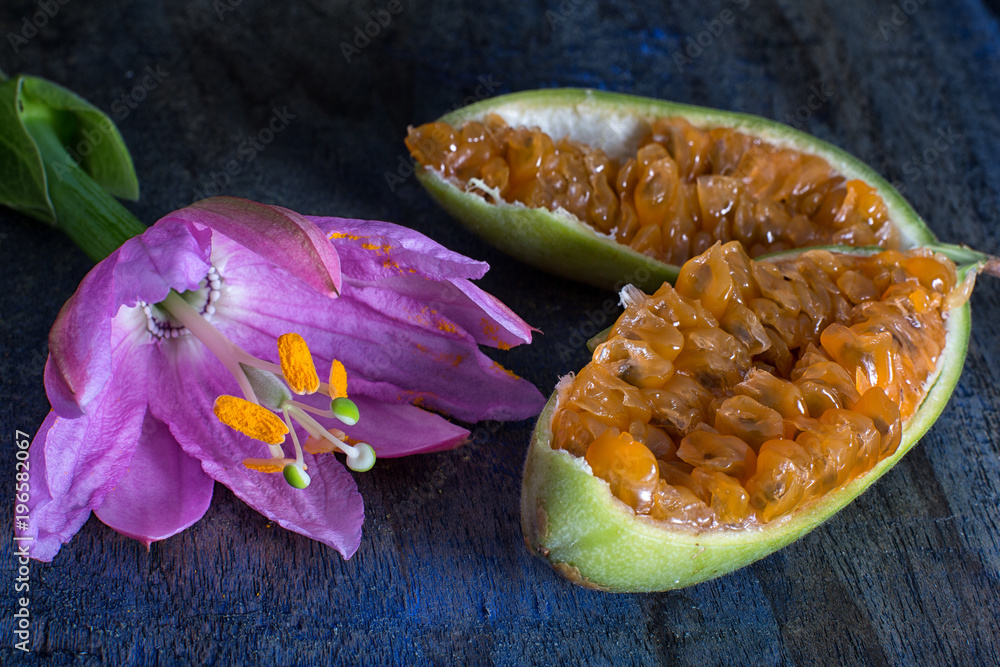cut passion fruit and flower also known as taxo Stock Photo | Adobe Stock