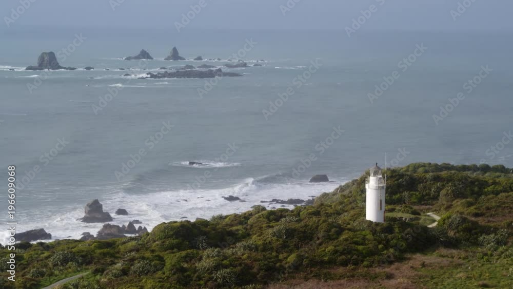 Drone shot Cape Foulwind lighthouse Stock Video | Adobe Stock
