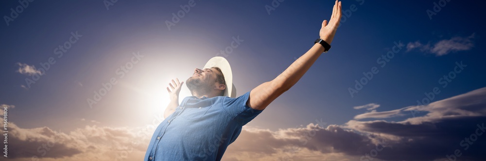 Composite image of happy man raising his arms up Stock Photo | Adobe Stock