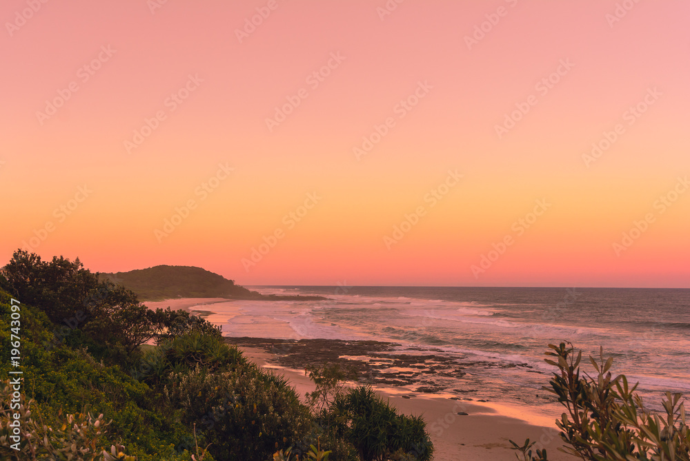 The Pinky sunset in summer time on the beach in Ballina with ocean view ...