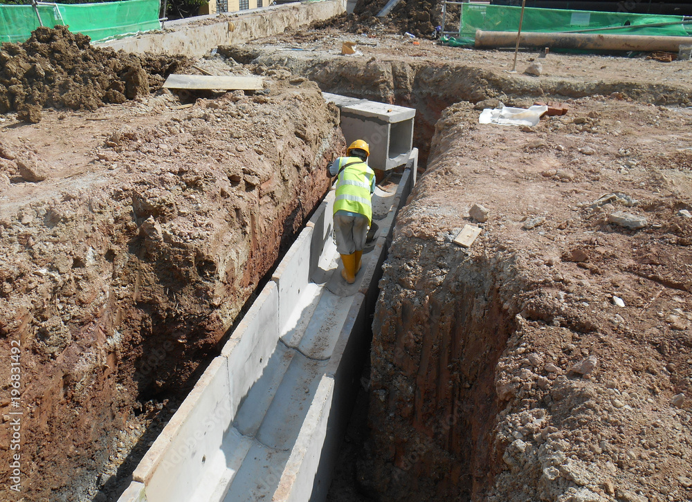 Underground precast concrete drainage under construction at the ...