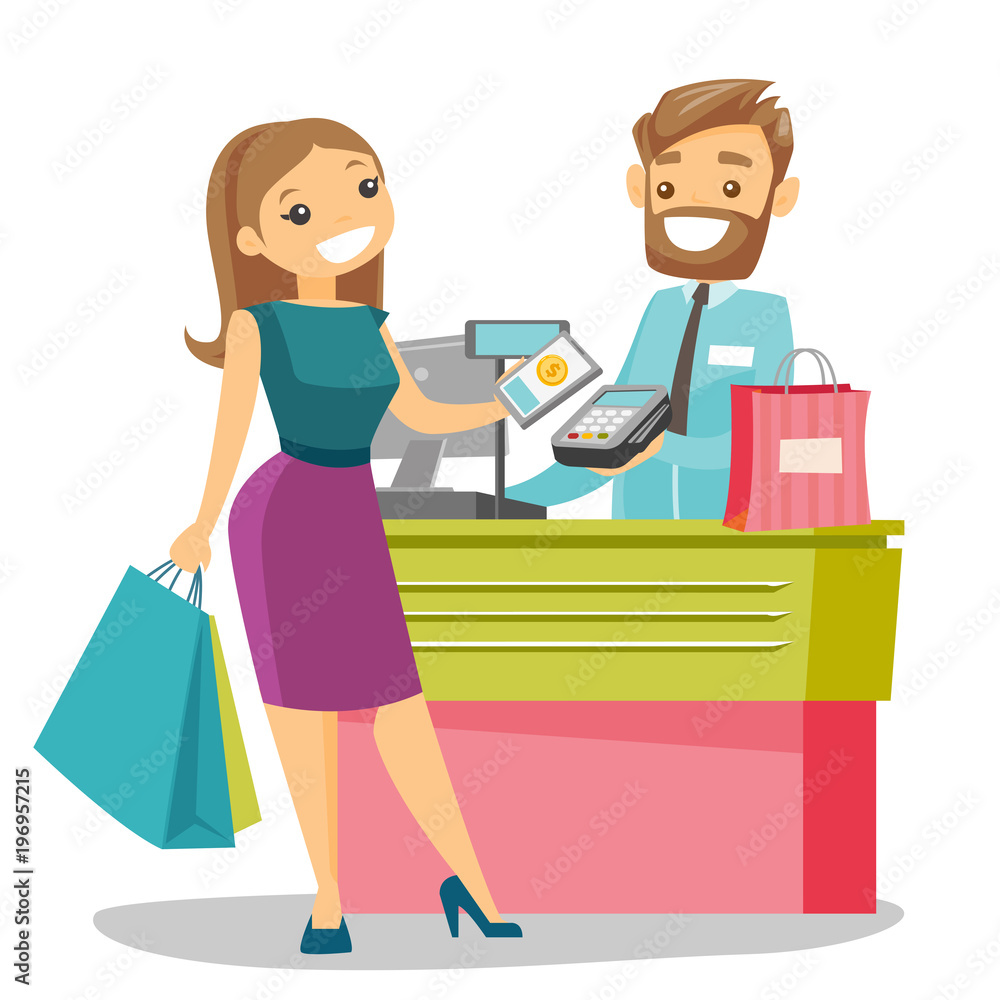 Young caucasian white woman paying wireless with her smartphone ...