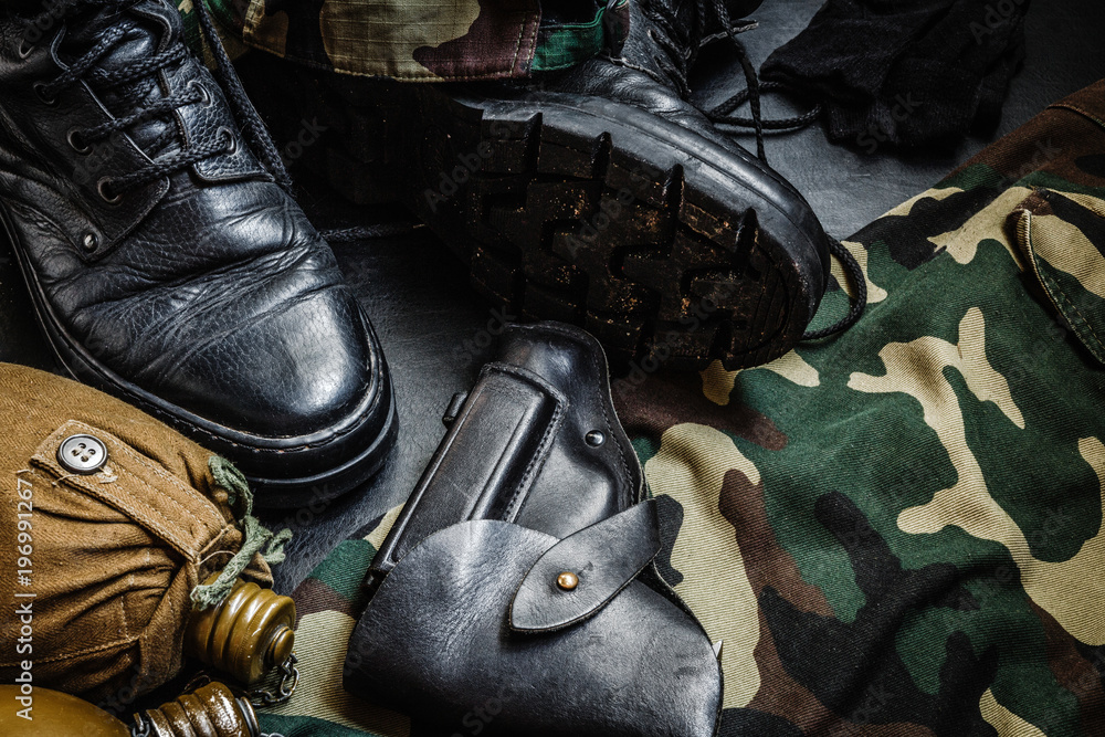 Army uniform military boots, boots, pants, bowler, pistol in holster on ...