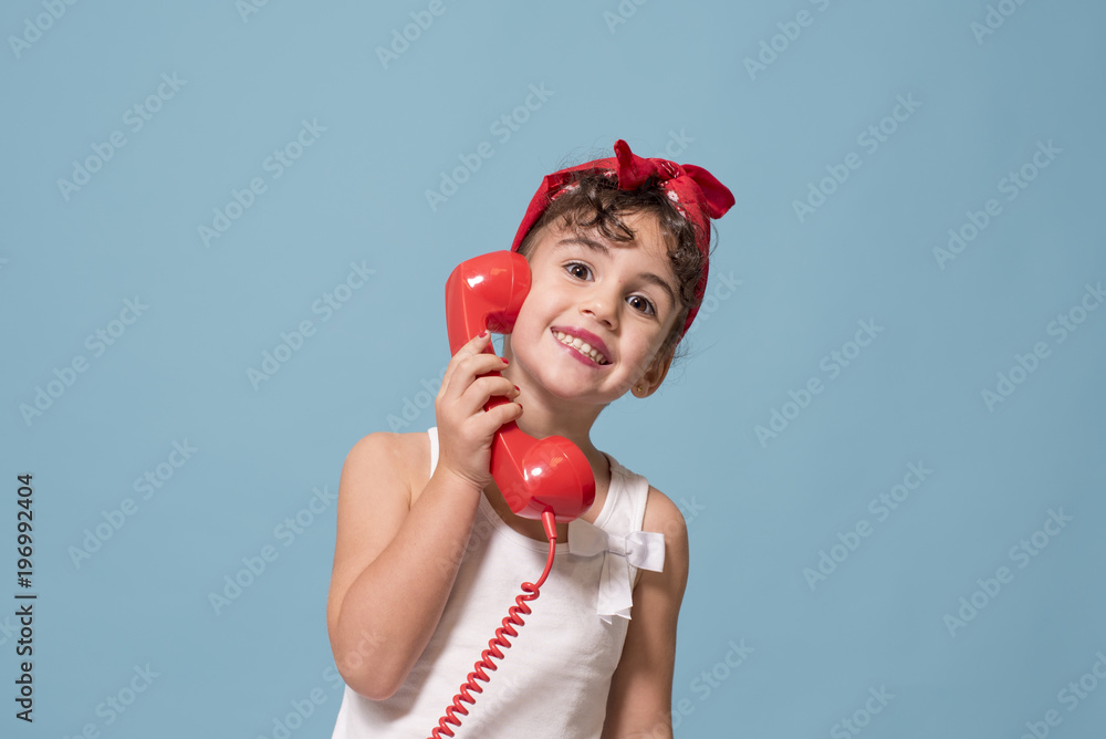 Pretty little girl posing Pin up Stock Photo | Adobe Stock