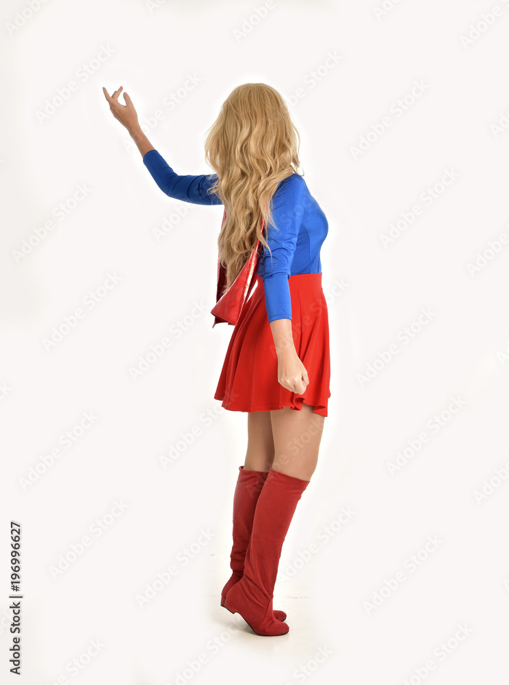 full length portrait of pretty girl wearing super hero costume ...