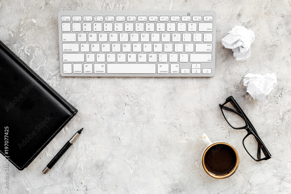 retro and modern writer desktop with keyboard, notebook and ink stone ...