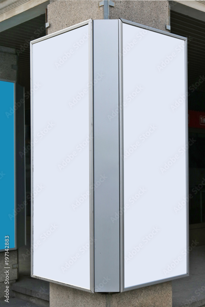 Metal vertical advertising boards are fixed on a concrete column Stock ...